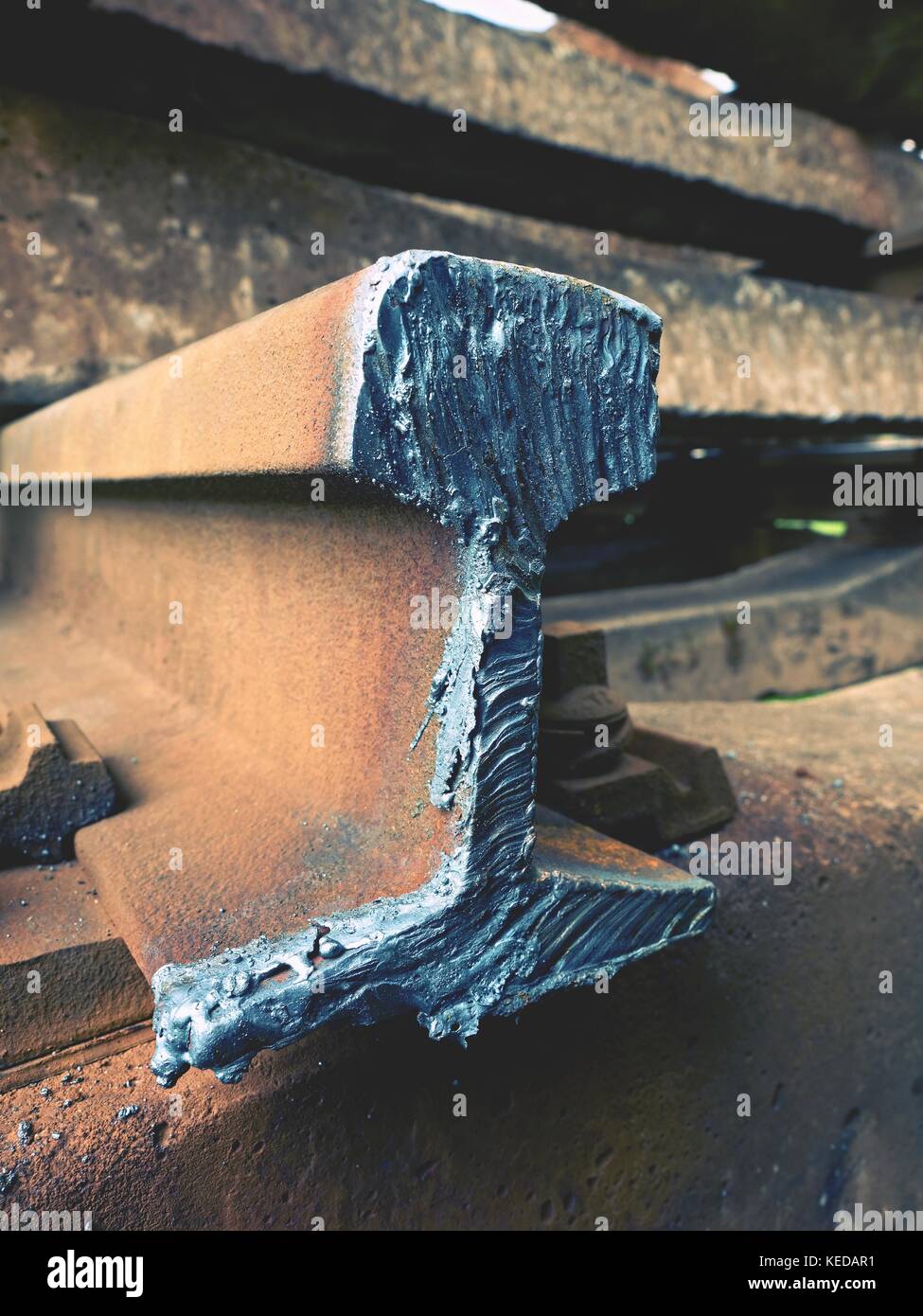 Detail of cut rail. Autogen torch cut rail rod on concrete sleeper ...