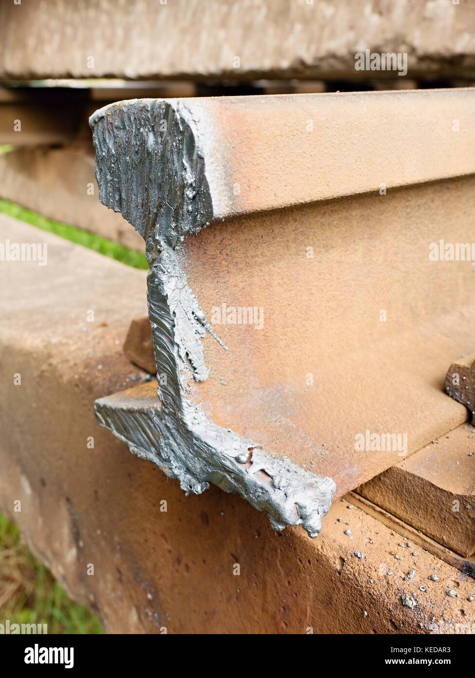 Detail of cut rail. Autogen torch cut rail rod on concrete sleeper ...