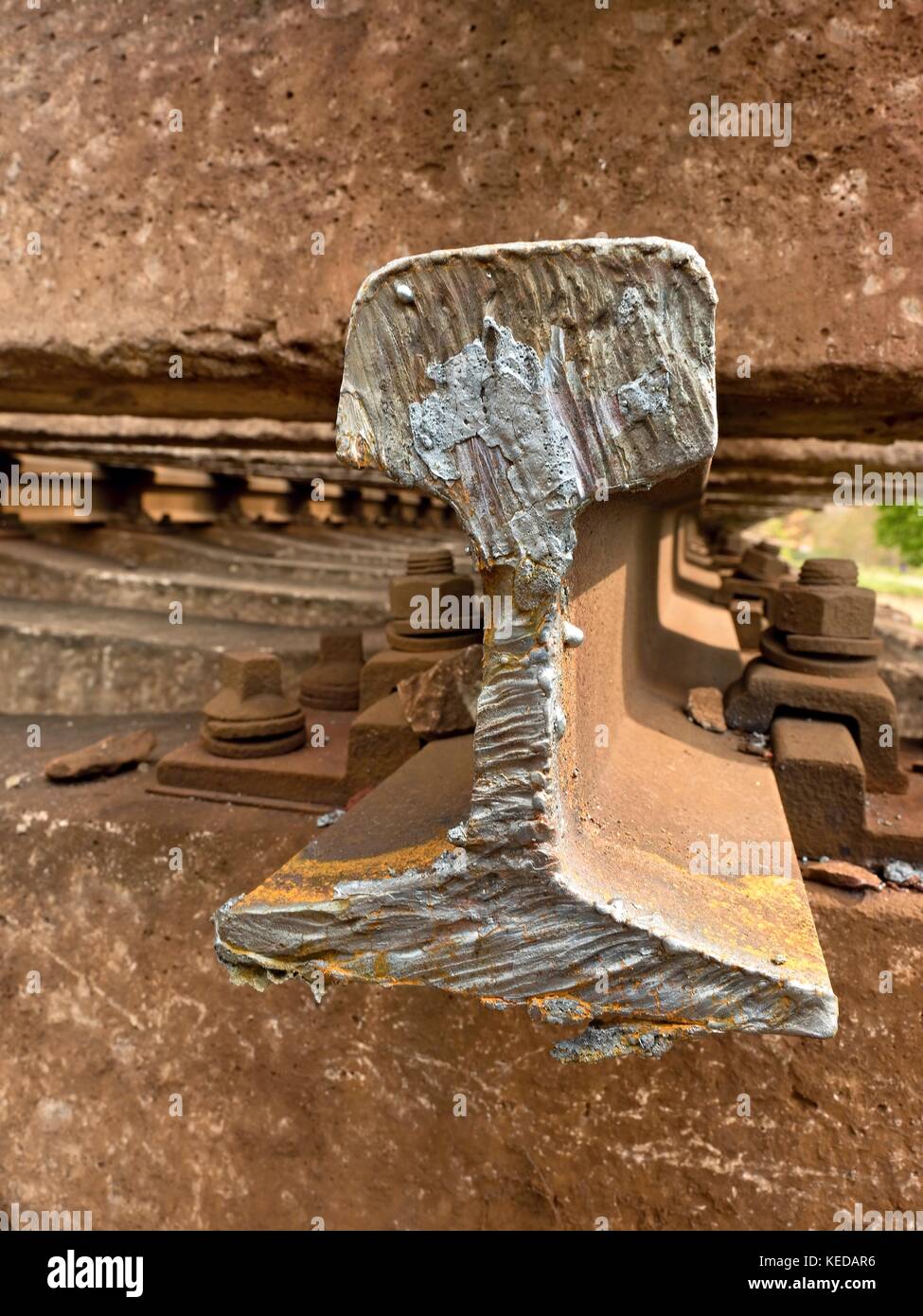 Detail of cut rail. Autogen torch cut rail rod on concrete sleeper ...