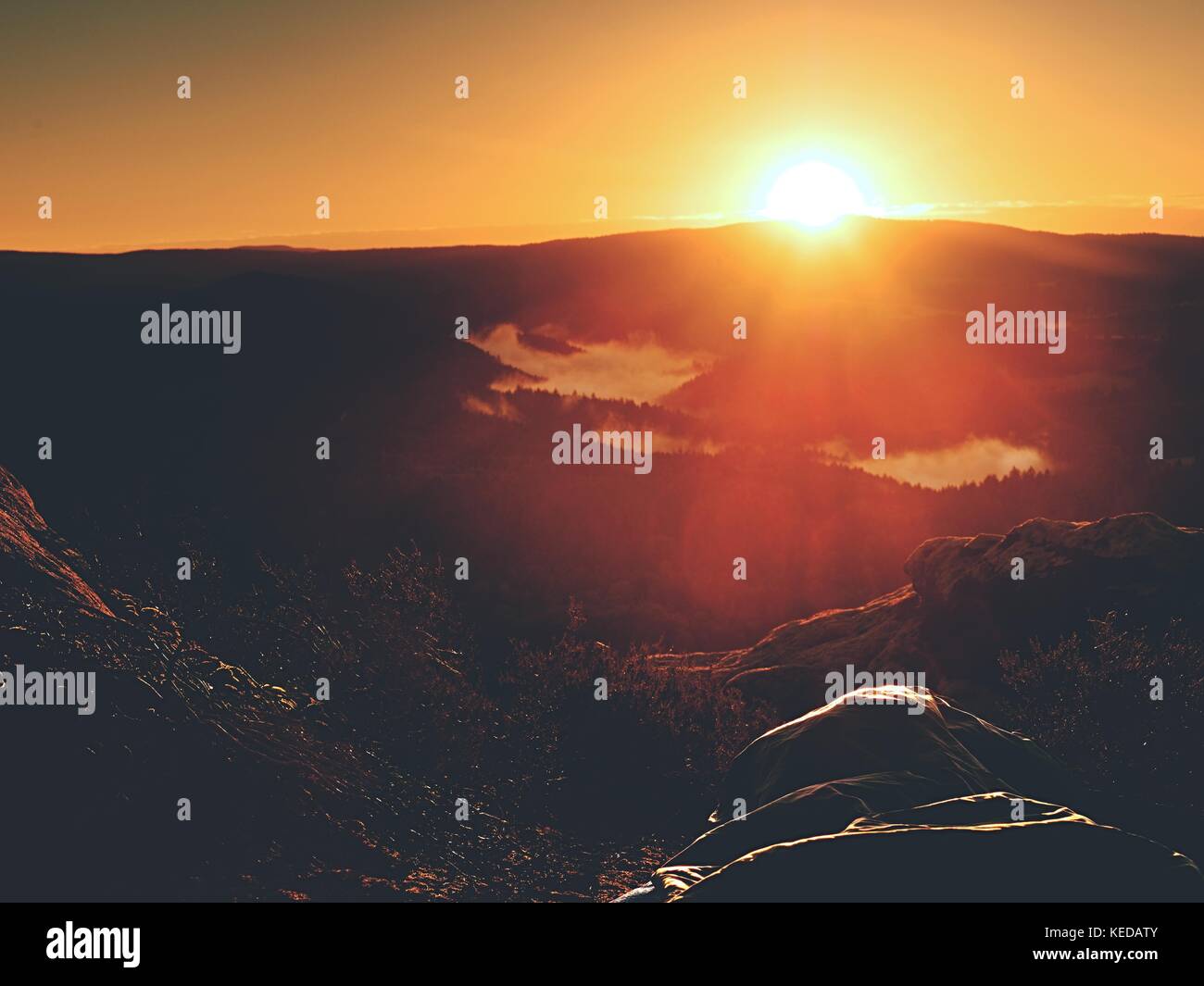 Beautiful awakening in rocks. Sleeping in nature in sleeping bag. View ...