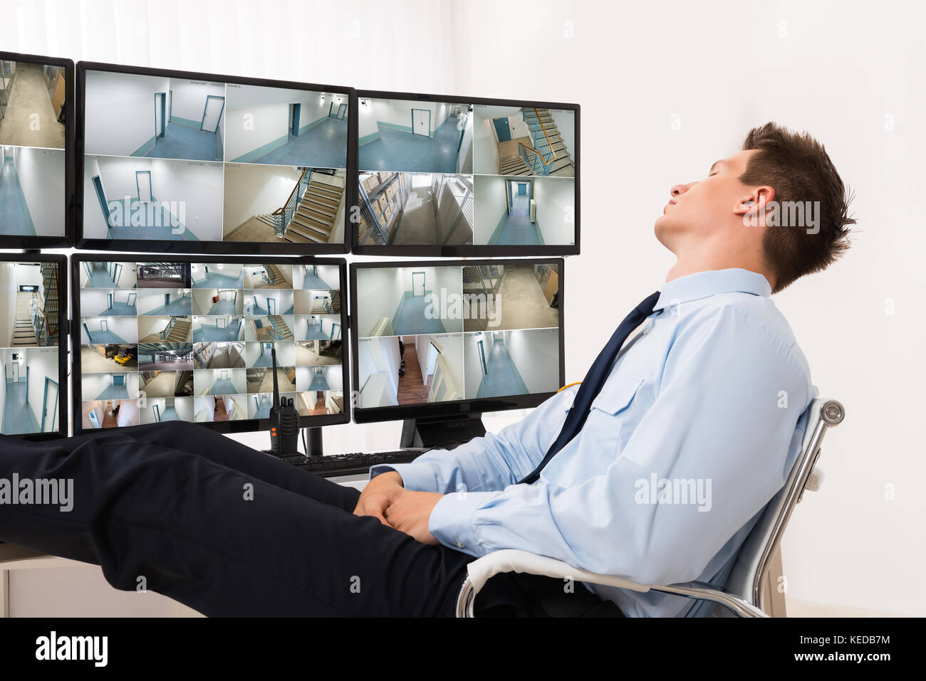 Sleeping security guard hi-res stock photography and images - Alamy