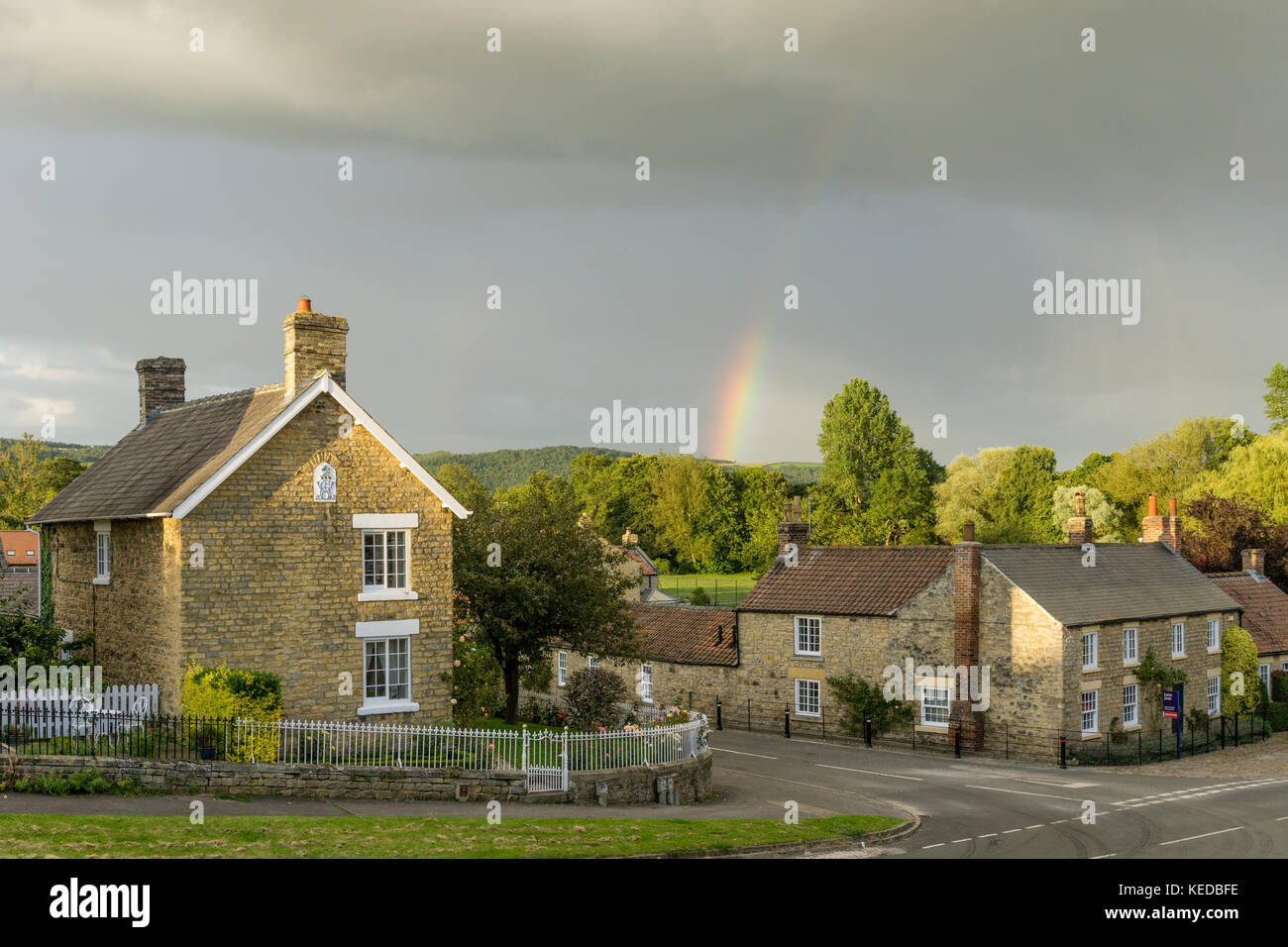 The crossroads in the pretty North Yorkshire village of Coxwold, with a ...