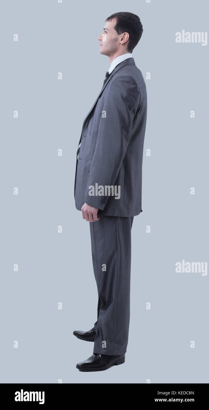Side view of business man isolated on gray background Stock Photo - Alamy