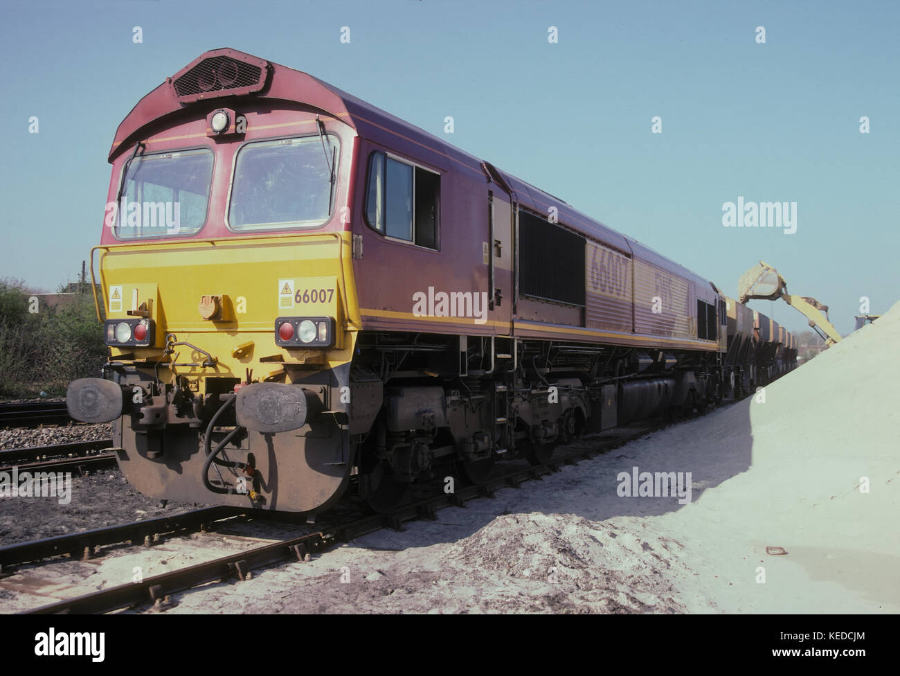 Class 66 locomotive on a freight train (sand) at Wool, Dorset Stock ...