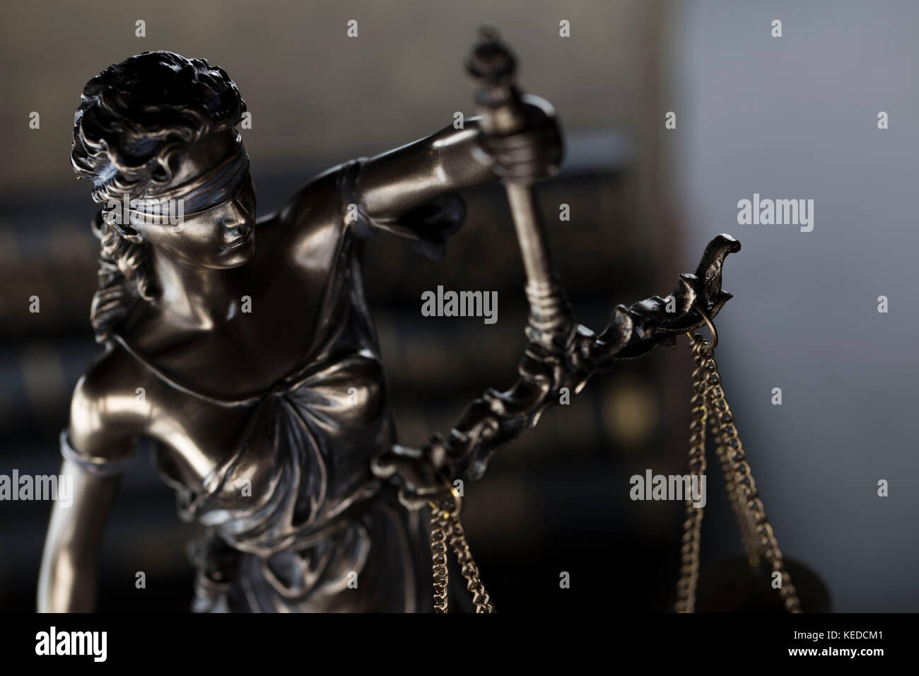 Legal concept. Statue of justice in court library Stock Photo - Alamy