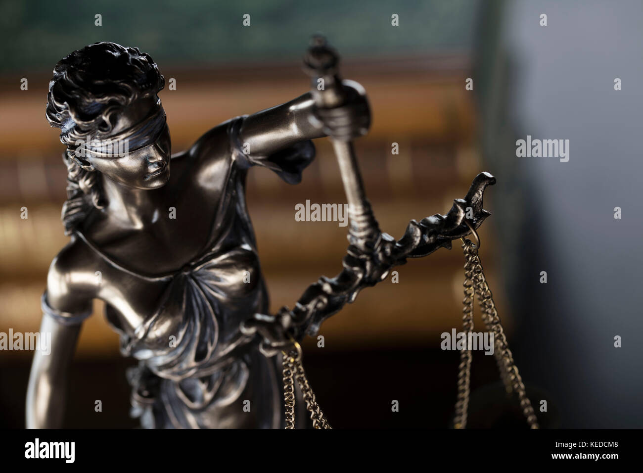 Legal concept. Statue of justice in court library Stock Photo - Alamy
