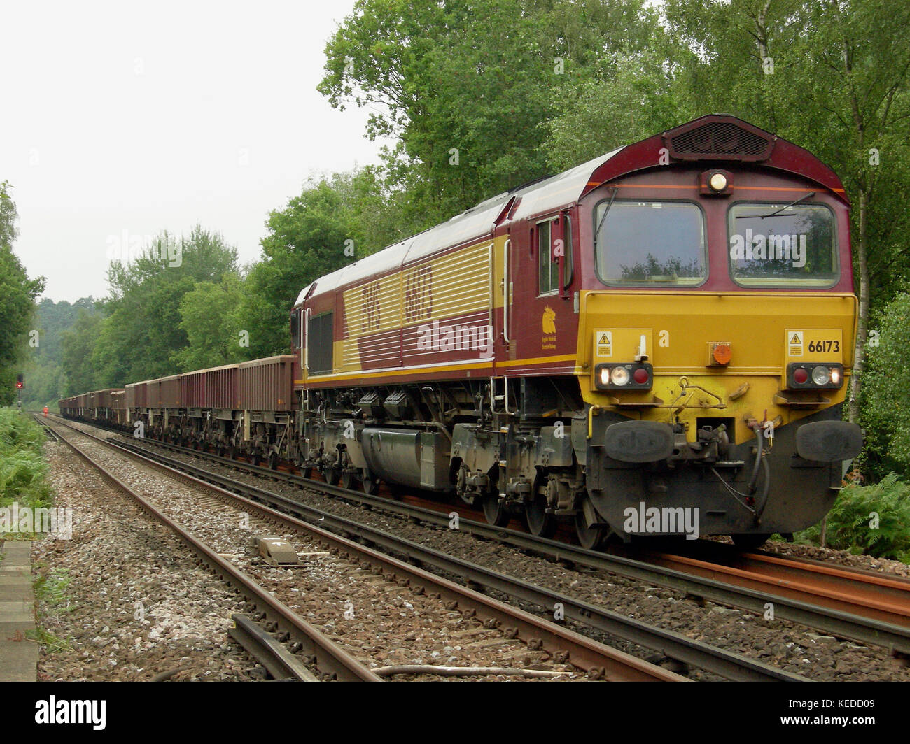 Class 66 locomotive on a freight train near Pirbright Junction, England ...