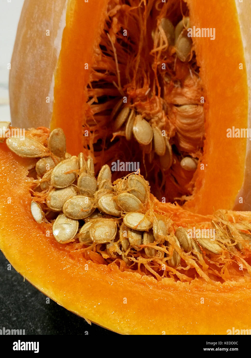 ripe pumpkins cut with seeds Stock Photo - Alamy