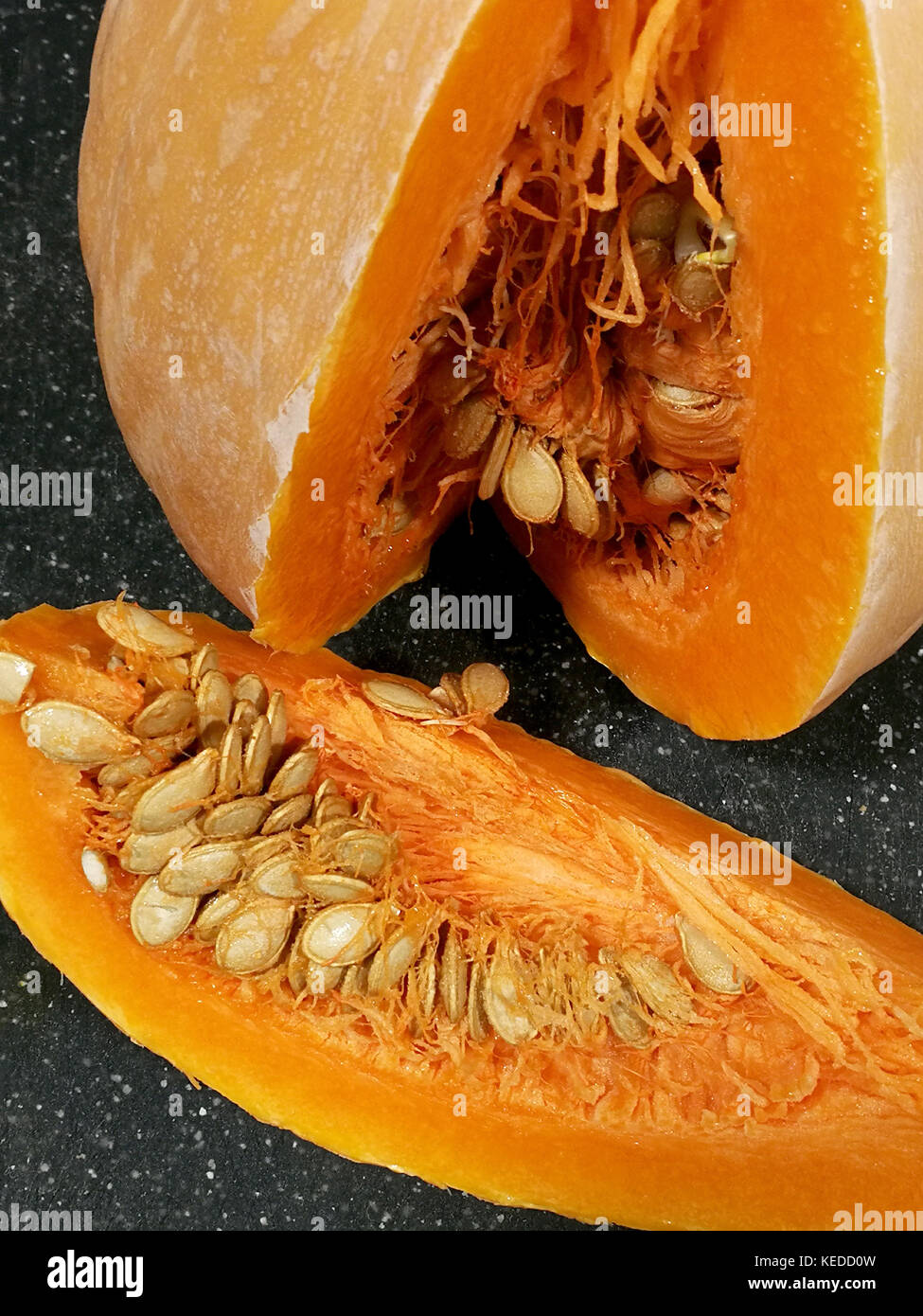 ripe pumpkins cut with seeds Stock Photo - Alamy