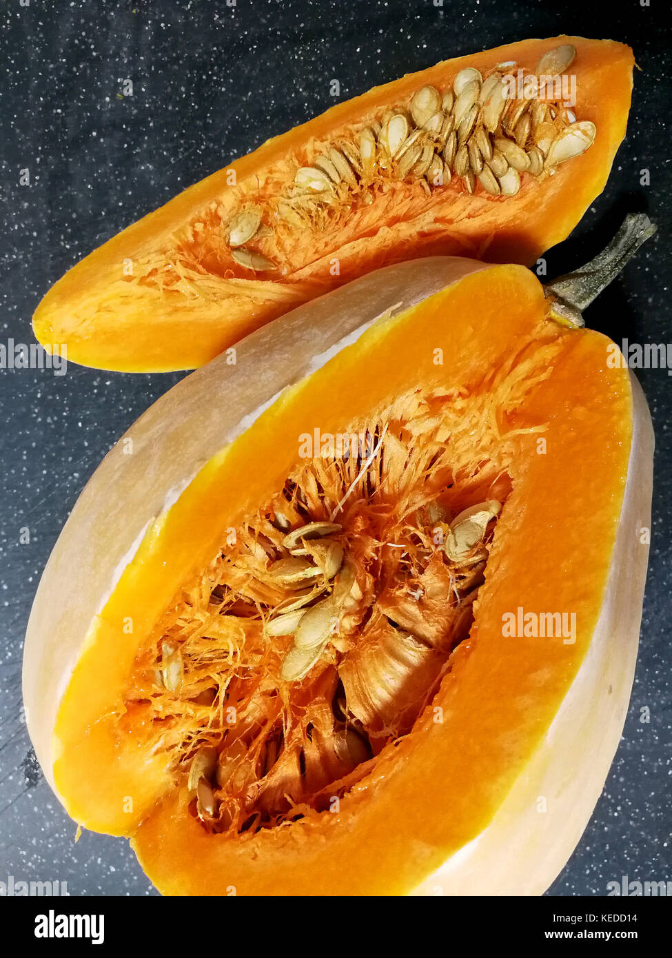 ripe pumpkins cut with seeds Stock Photo - Alamy
