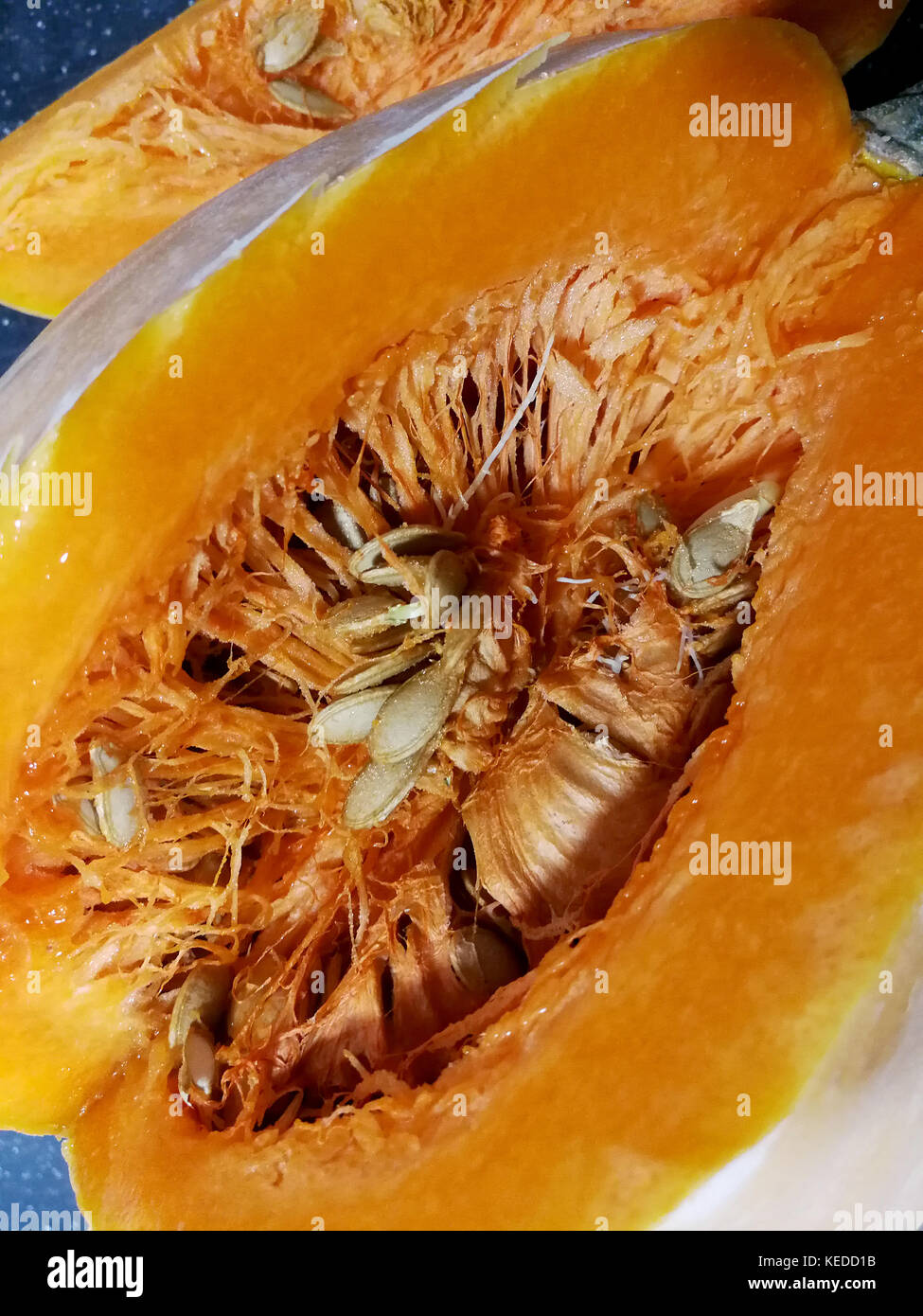 ripe pumpkins cut with seeds Stock Photo - Alamy