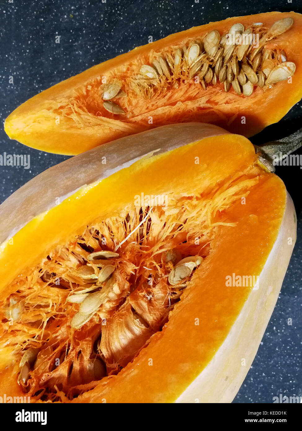 ripe pumpkins cut with seeds Stock Photo - Alamy