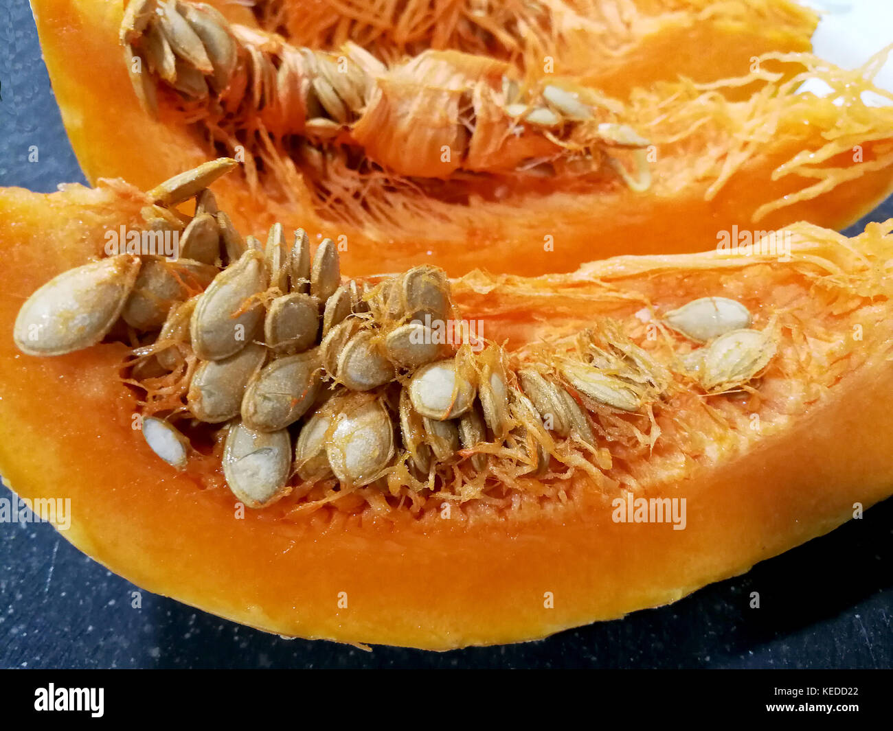 ripe pumpkins cut with seeds Stock Photo - Alamy