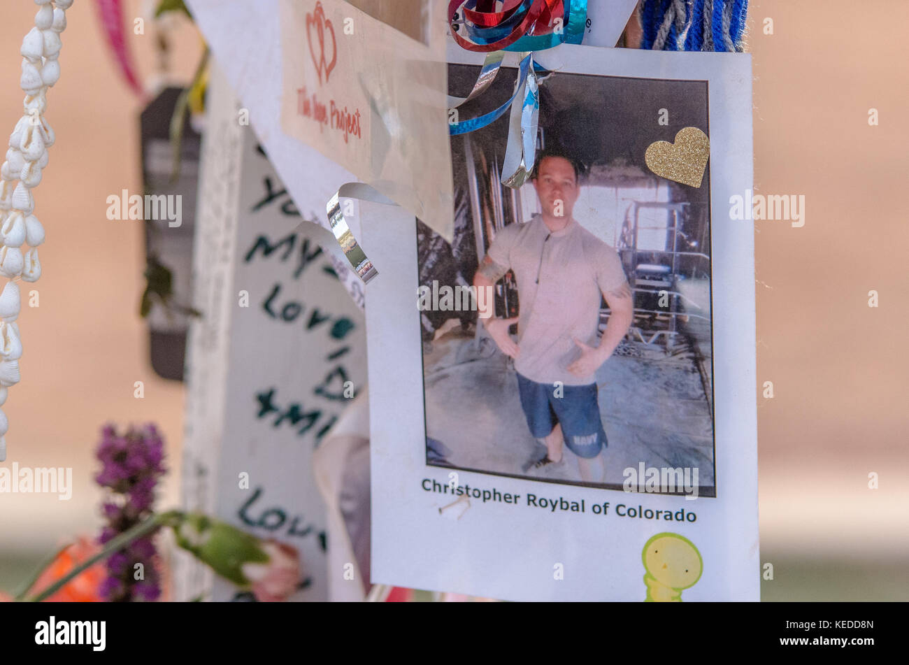 Visitors set up memorials to those lost in the Route 91 Shooting at the ...