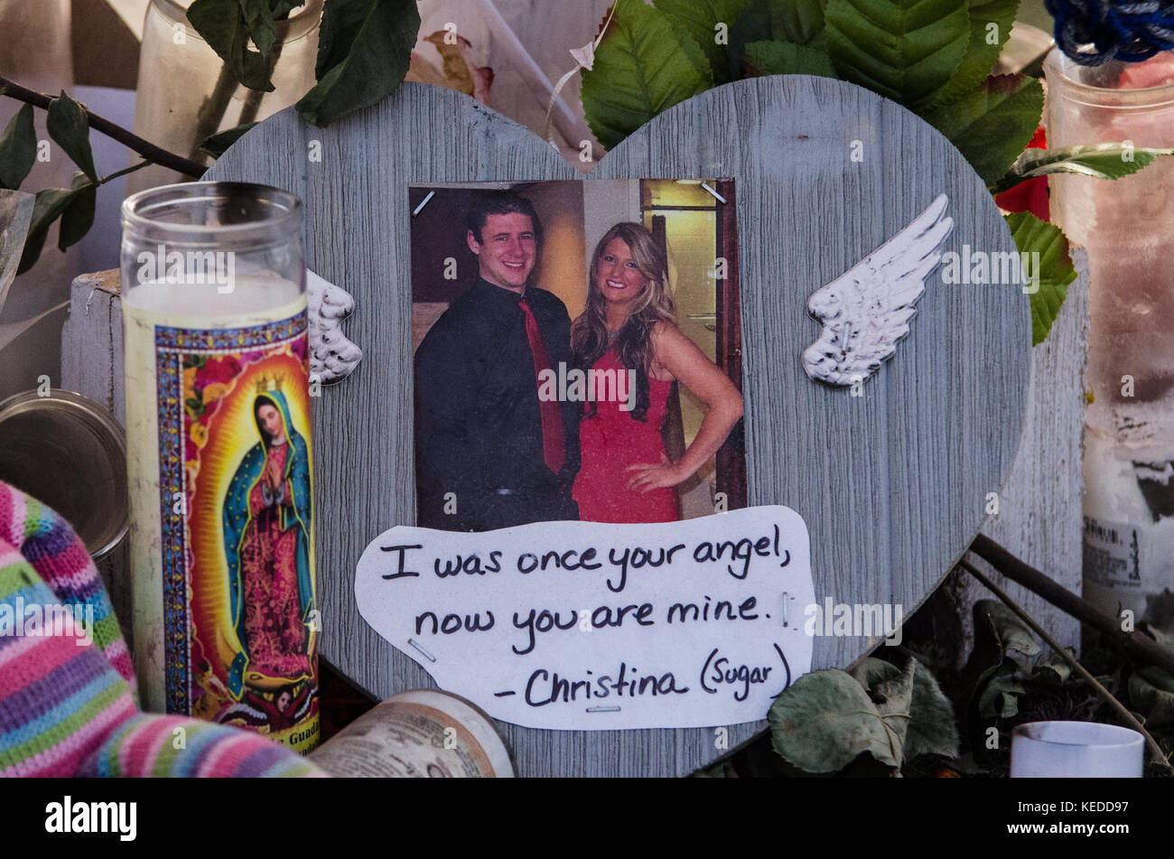 Visitors set up memorials to those lost in the Route 91 Shooting at the ...