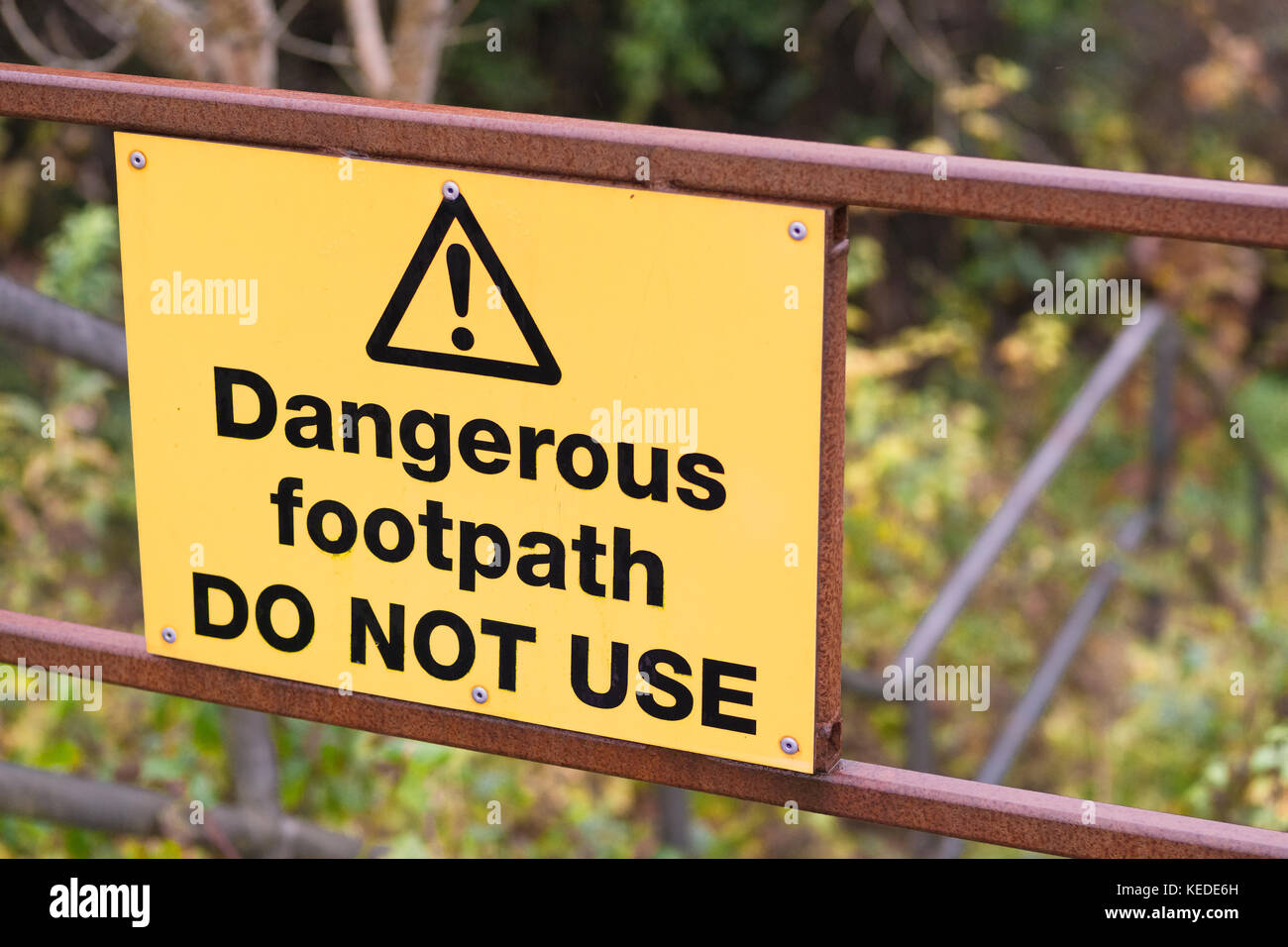 Broken footpath sign hi-res stock photography and images - Alamy