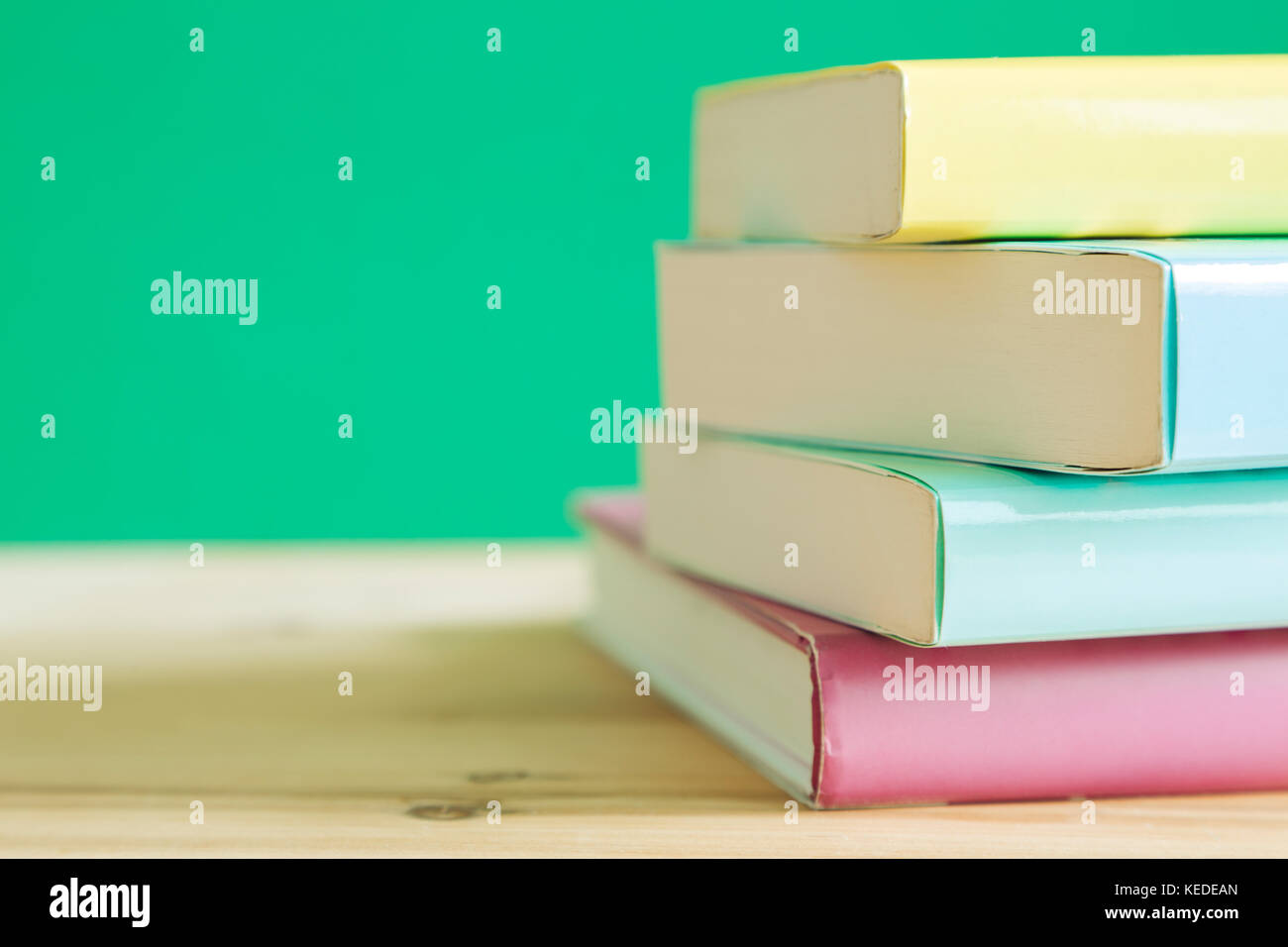 books on a wooden desk Stock Photo - Alamy
