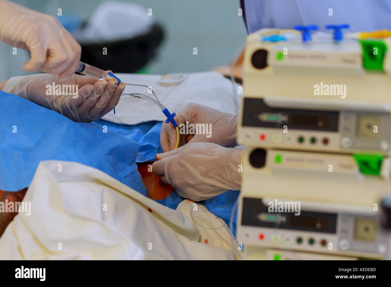 introduction of a medicine to a patient during surgery Stock Photo - Alamy
