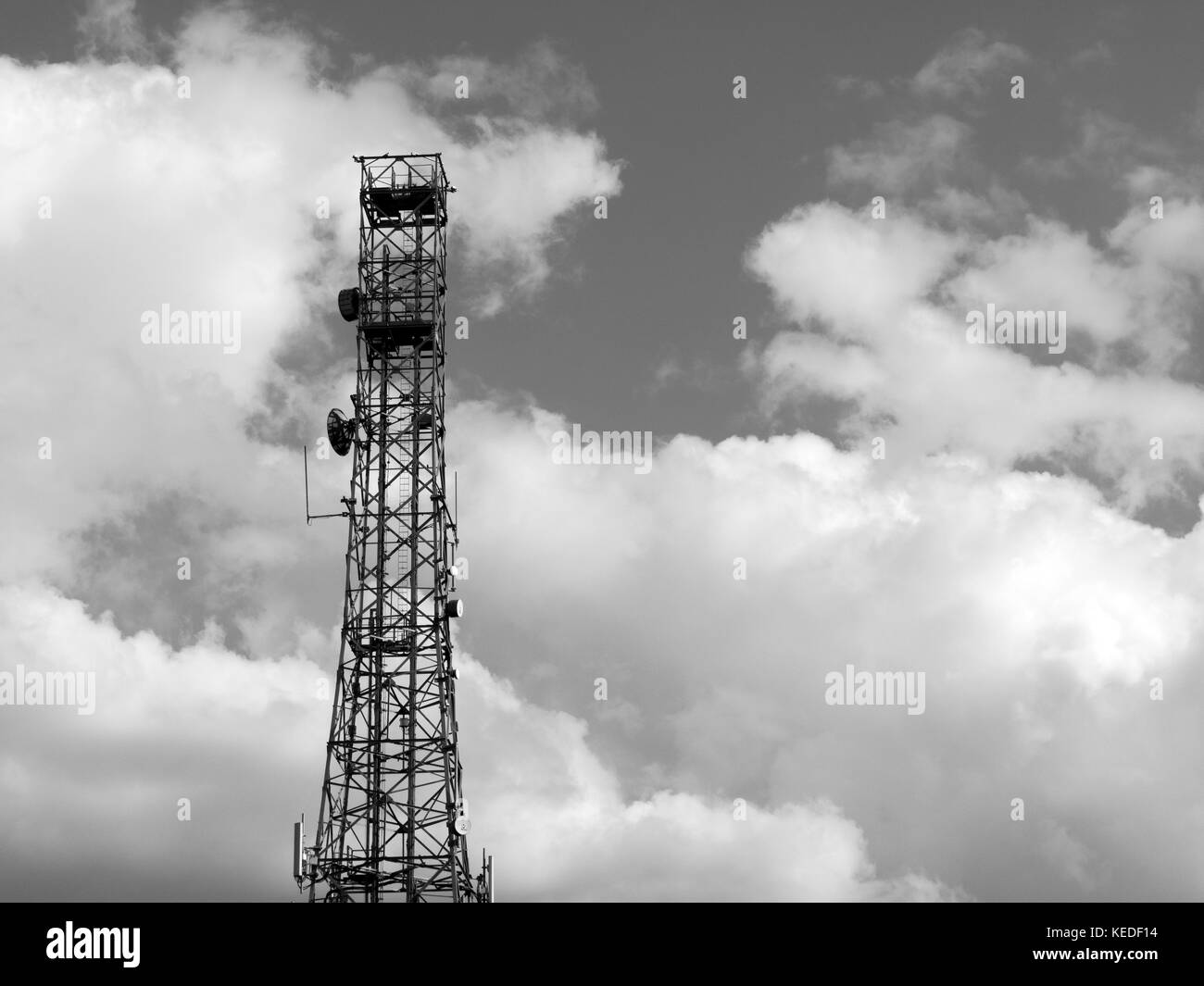 Mobile telephone communications base station tower sited on farmland ...