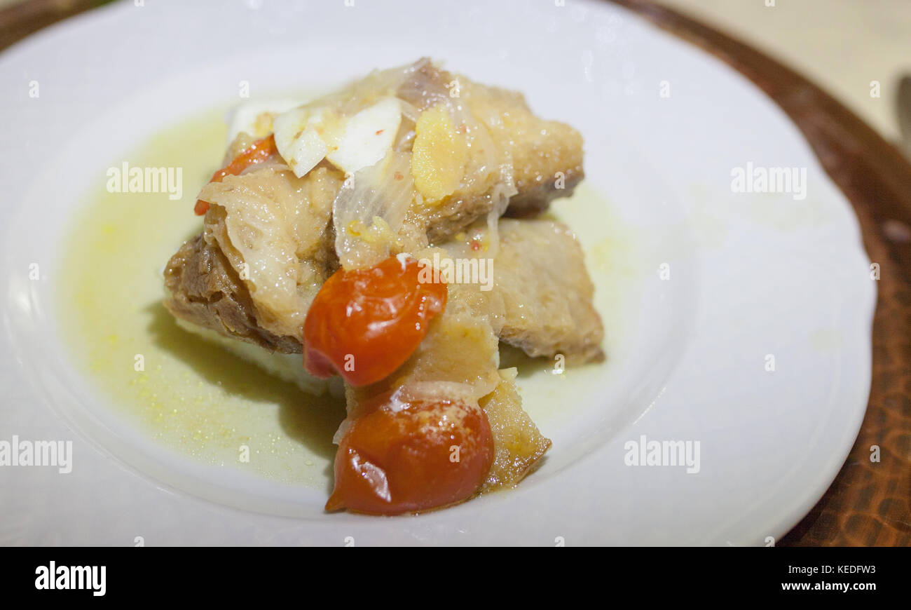 dish of salt cod in low-temperature frying Stock Photo - Alamy