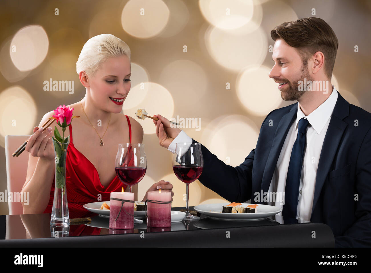 Man feeding woman hi-res stock photography and images - Alamy