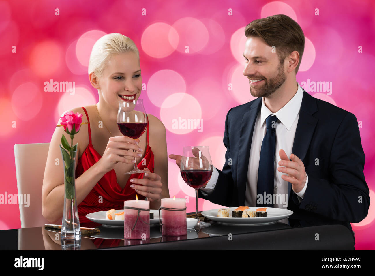 Portrait Of A Young Couple Having Dinner In A Restaurant In Bokeh ...