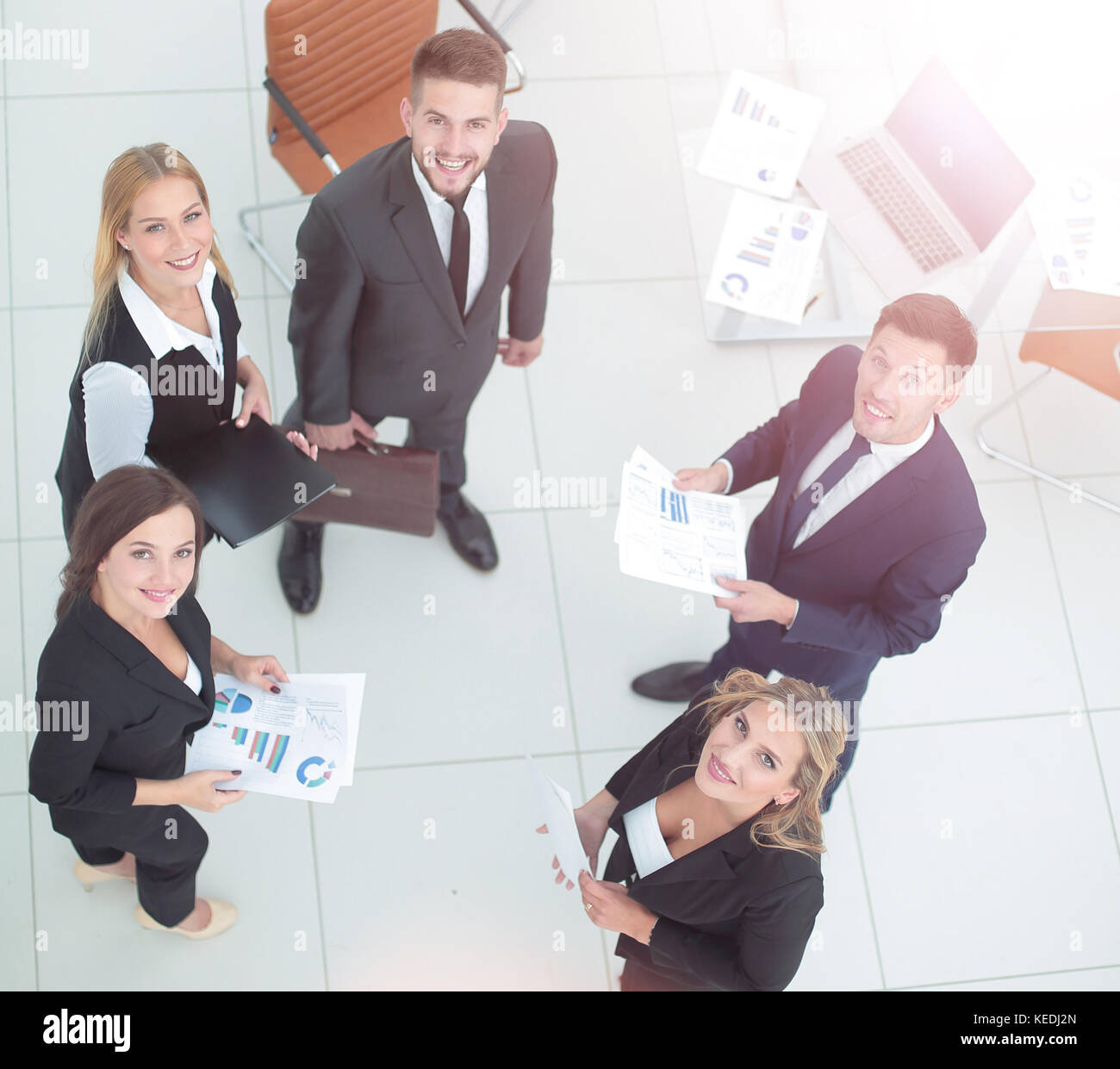 Successful business people looking happy and confident. Showing Stock ...