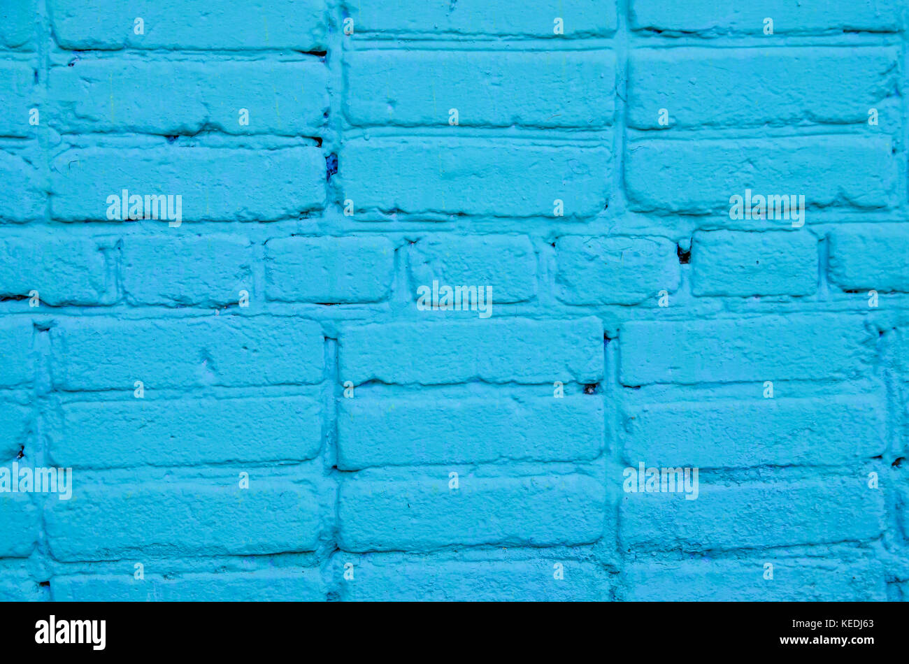 brick wall painted wit color. saturated color Stock Photo - Alamy