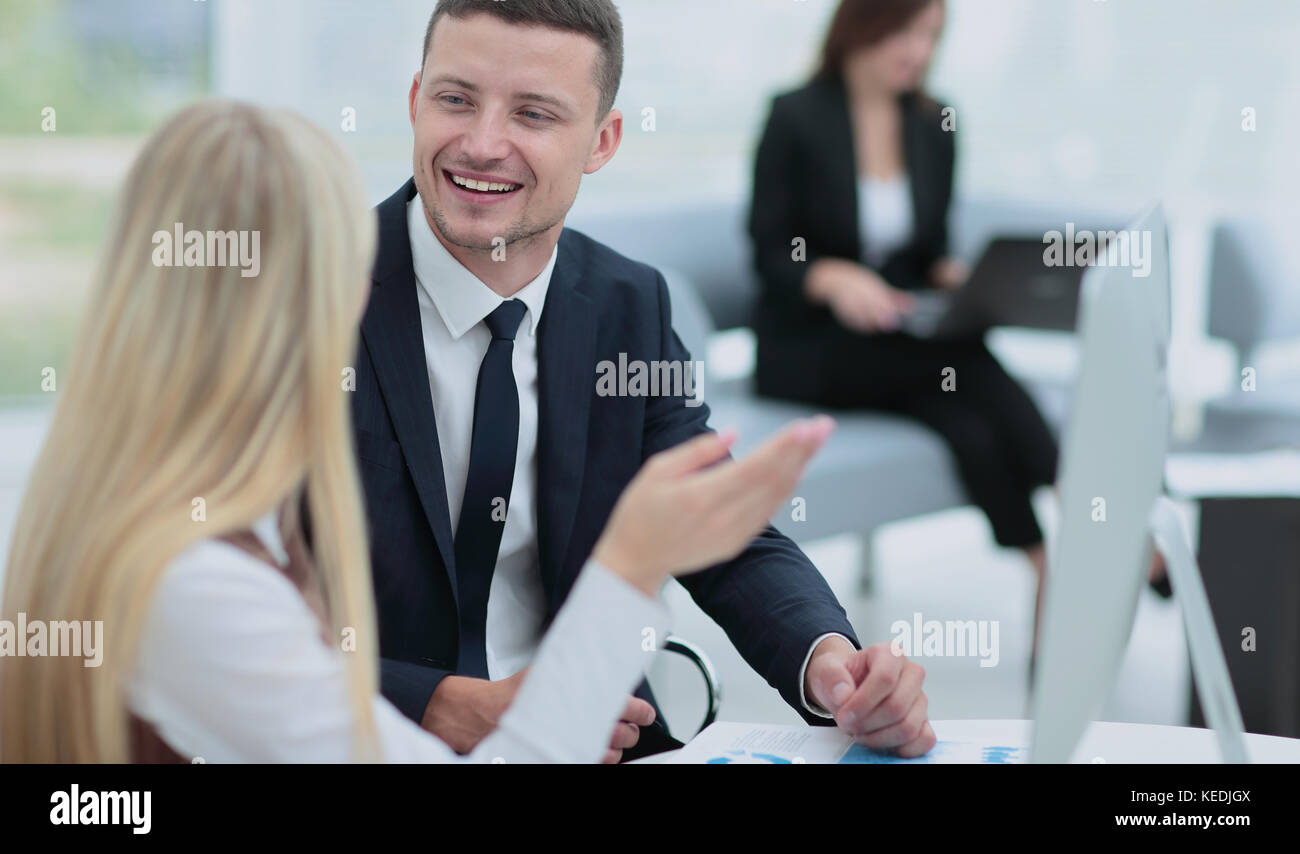 Image of two young business people interacting at meeting in off Stock ...