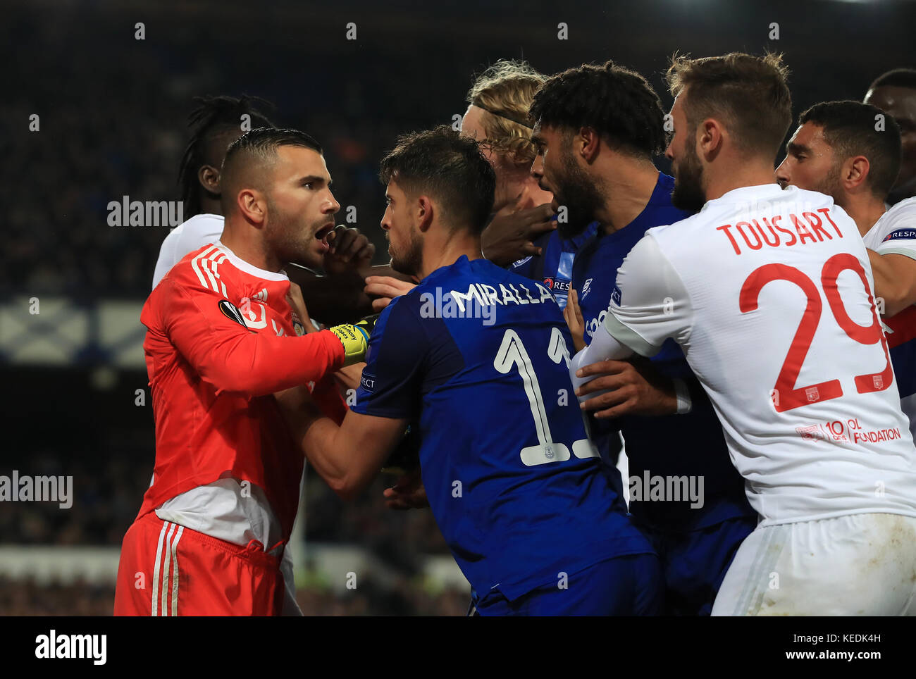 Everton's Ashley Williams clashes with Olympique Lyonnais goalkeeper ...