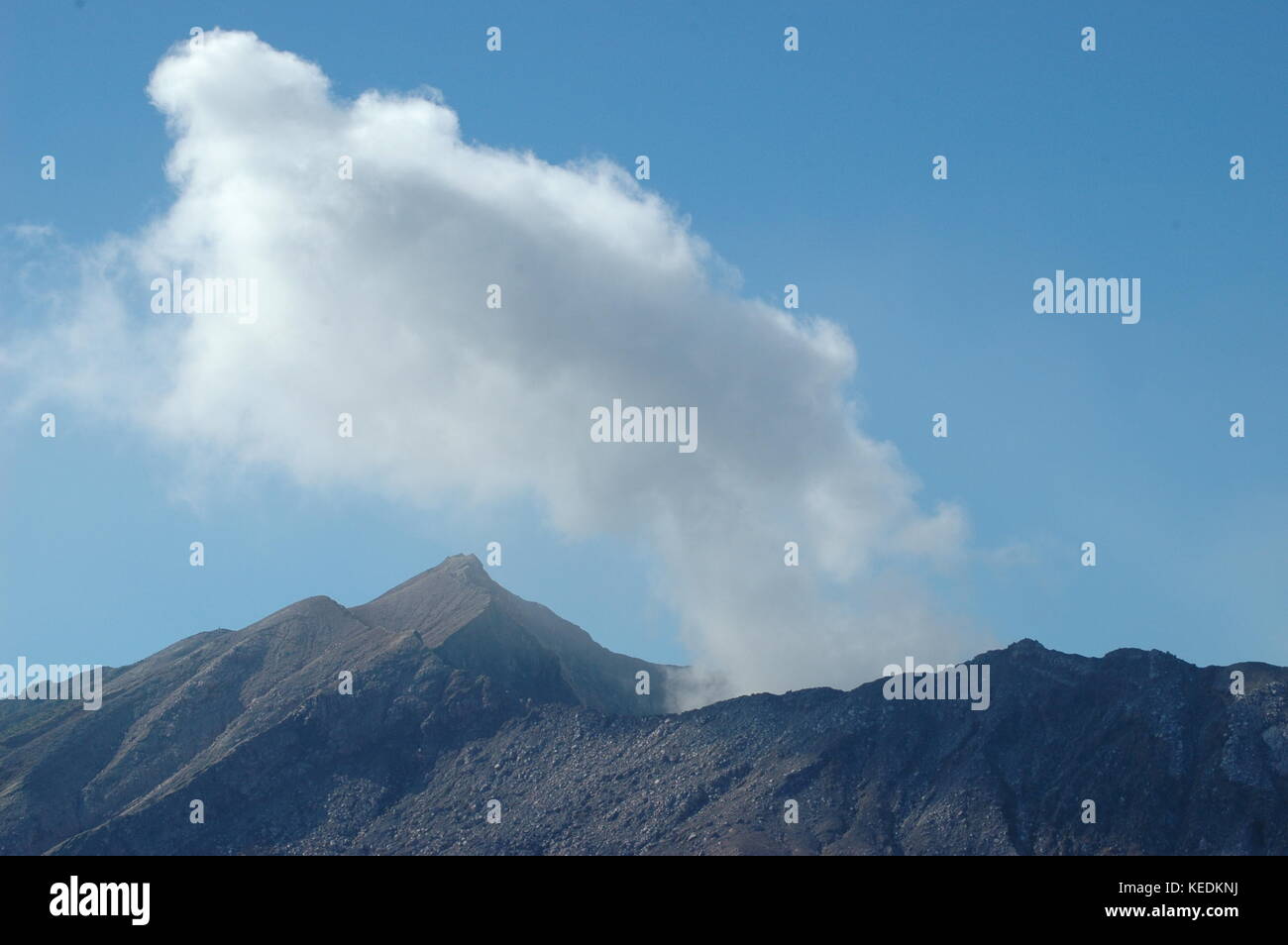 Smoke rising from volcano hi-res stock photography and images - Alamy
