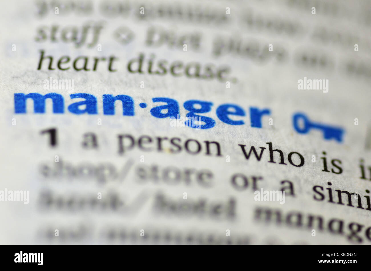 Manager word on book Stock Photo - Alamy