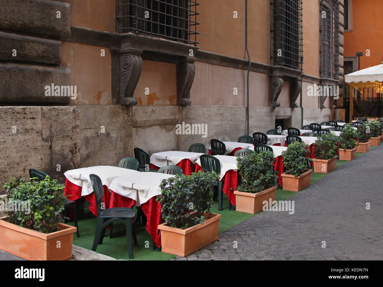 Old retro cafe tables on Italy street Stock Photo - Alamy