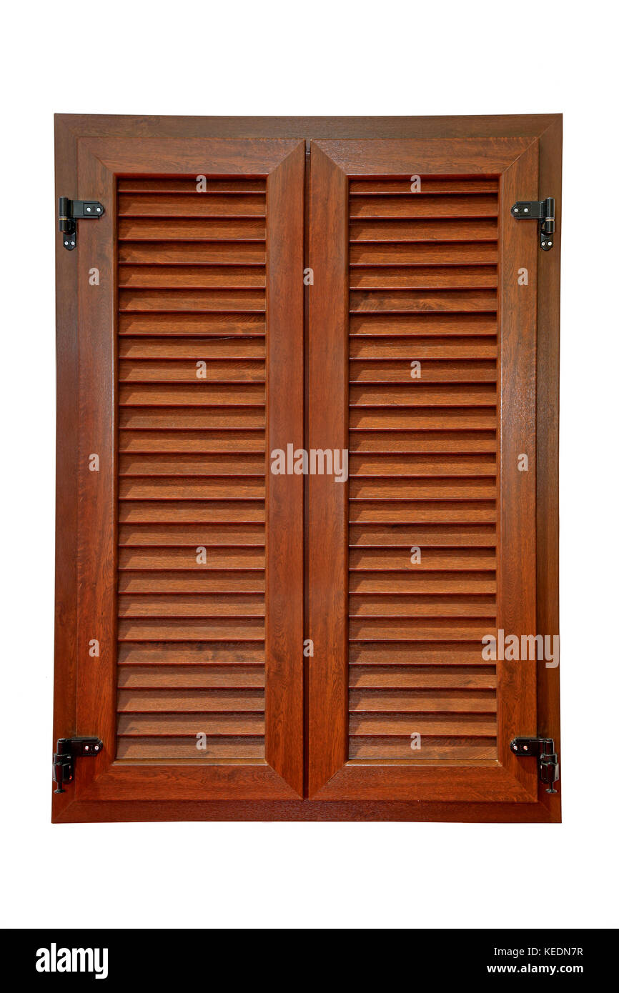 Retro window with closed brown wooden shutters Stock Photo - Alamy