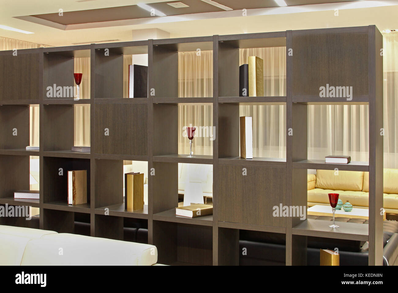 Wooden shelf furniture unit in modern interior Stock Photo - Alamy