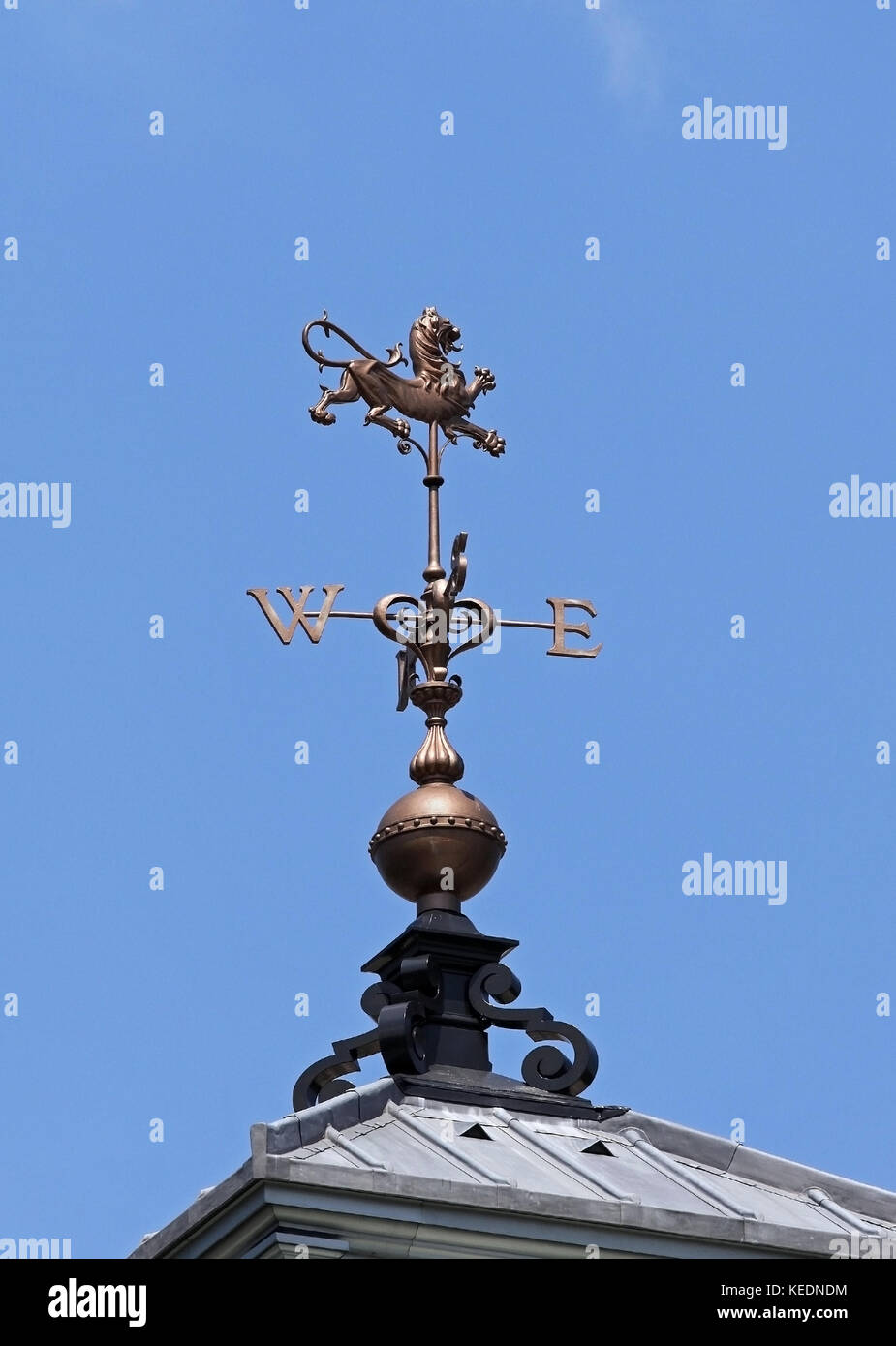Weather vane on roof of the building Stock Photo - Alamy