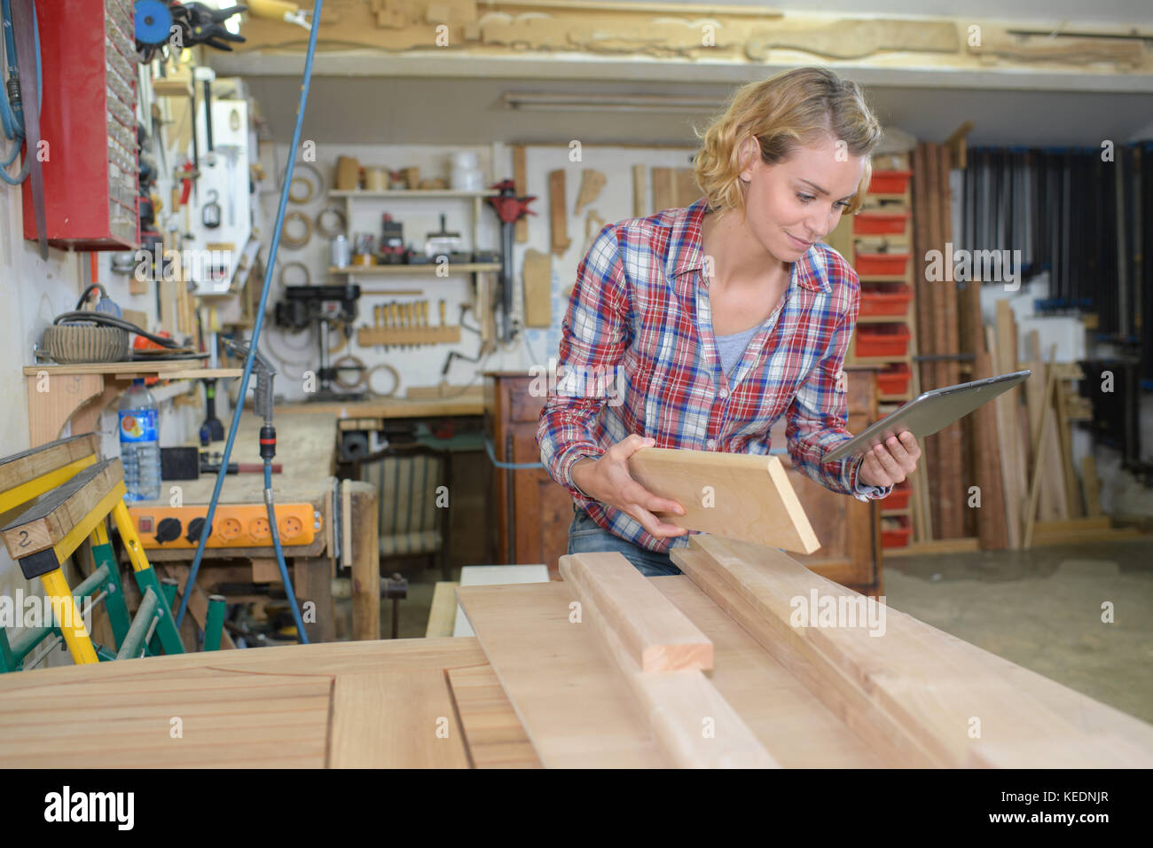 Beautiful female carpenter woodshop hi-res stock photography and images ...