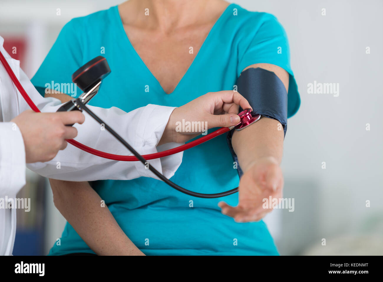 close-up of patient arm during blood pressure measuring Stock Photo - Alamy