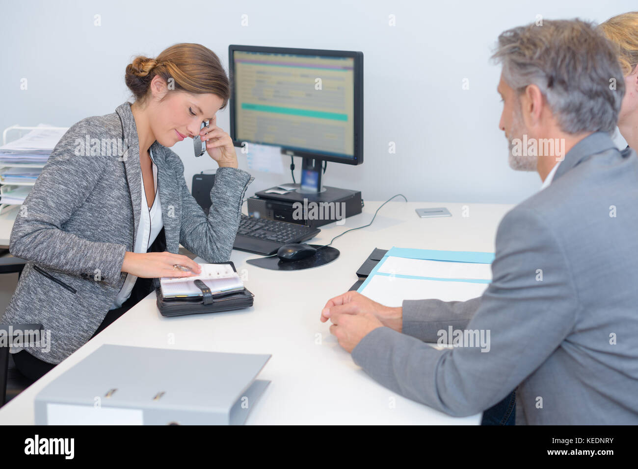 loan officer having a phone conversation Stock Photo - Alamy