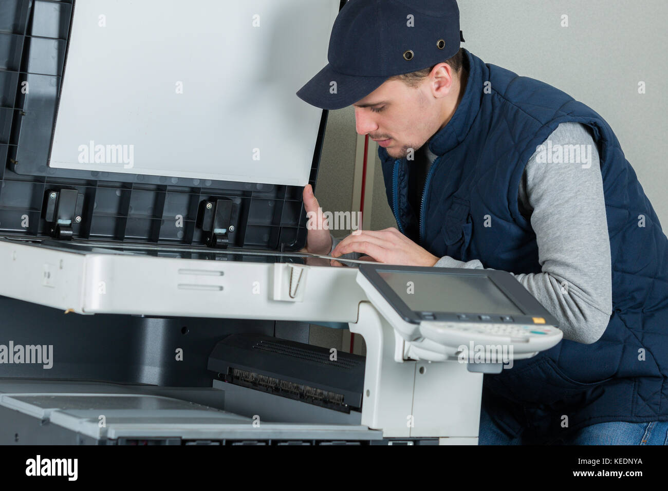 fixing an office printer Stock Photo - Alamy