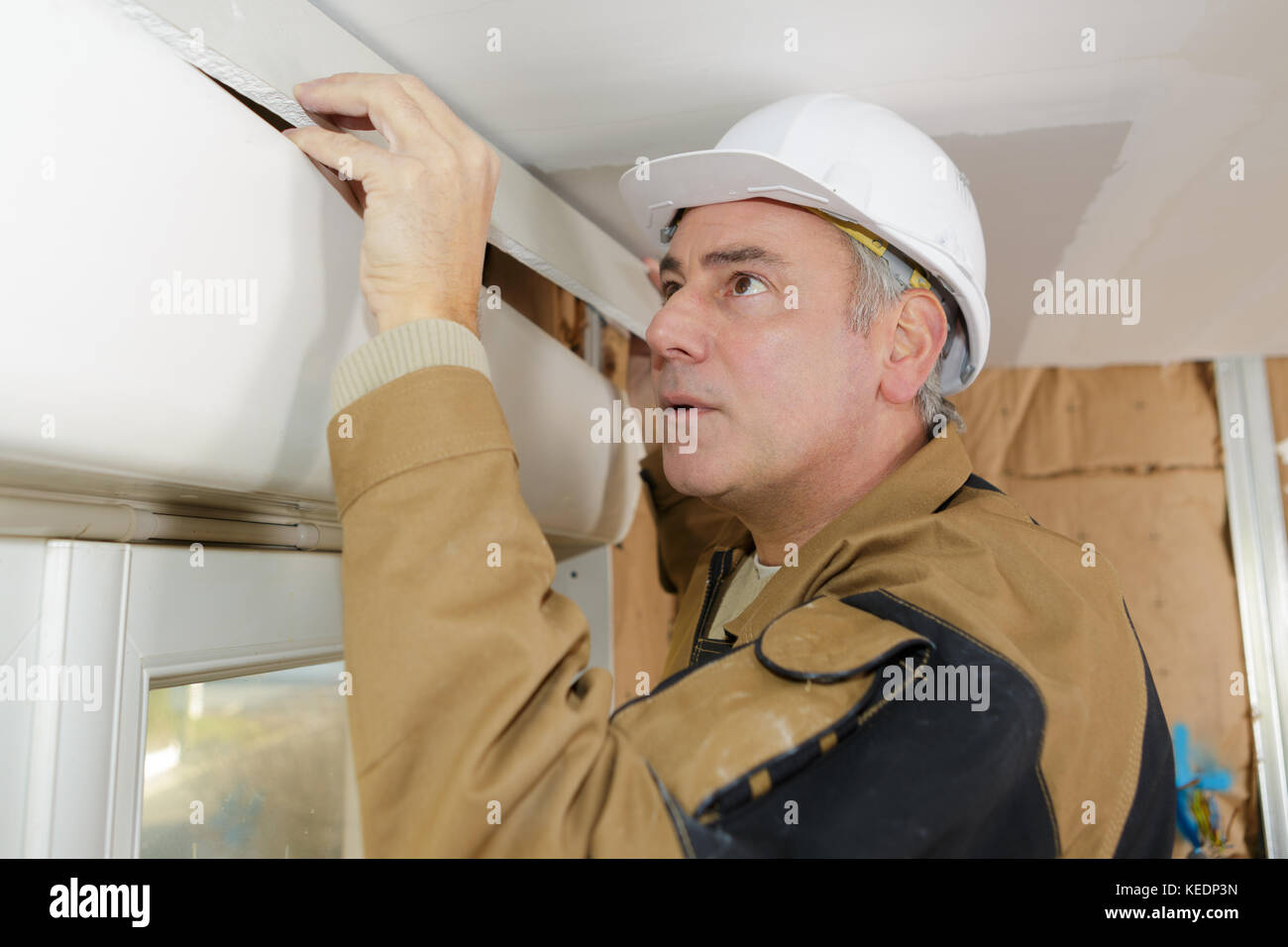 Molding installation hi-res stock photography and images - Alamy