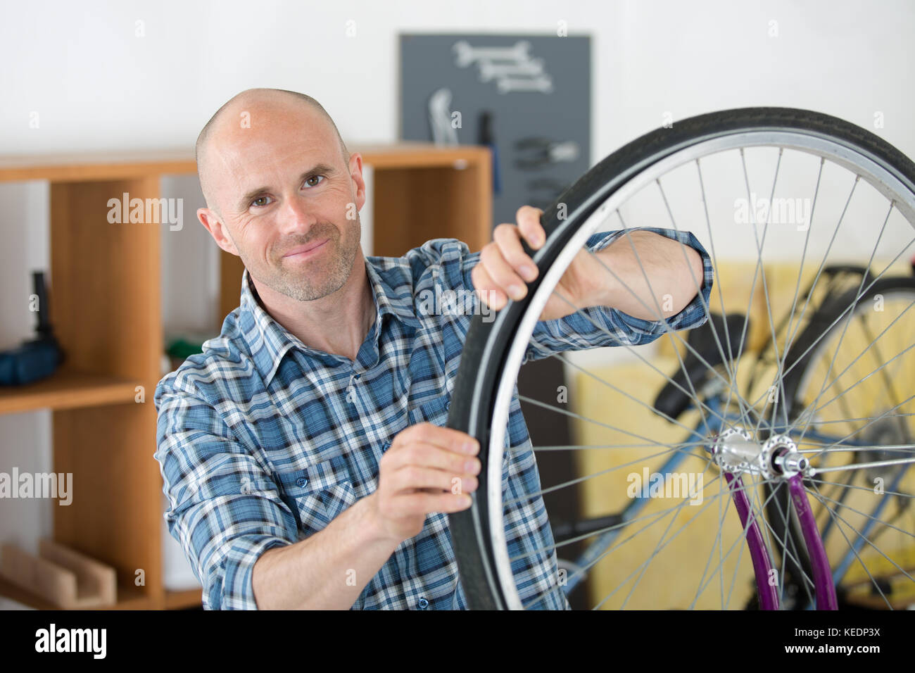 repairing gear bike shop Stock Photo - Alamy