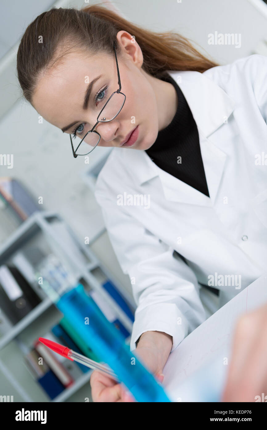 female researcher with glass equipment in the lab Stock Photo - Alamy