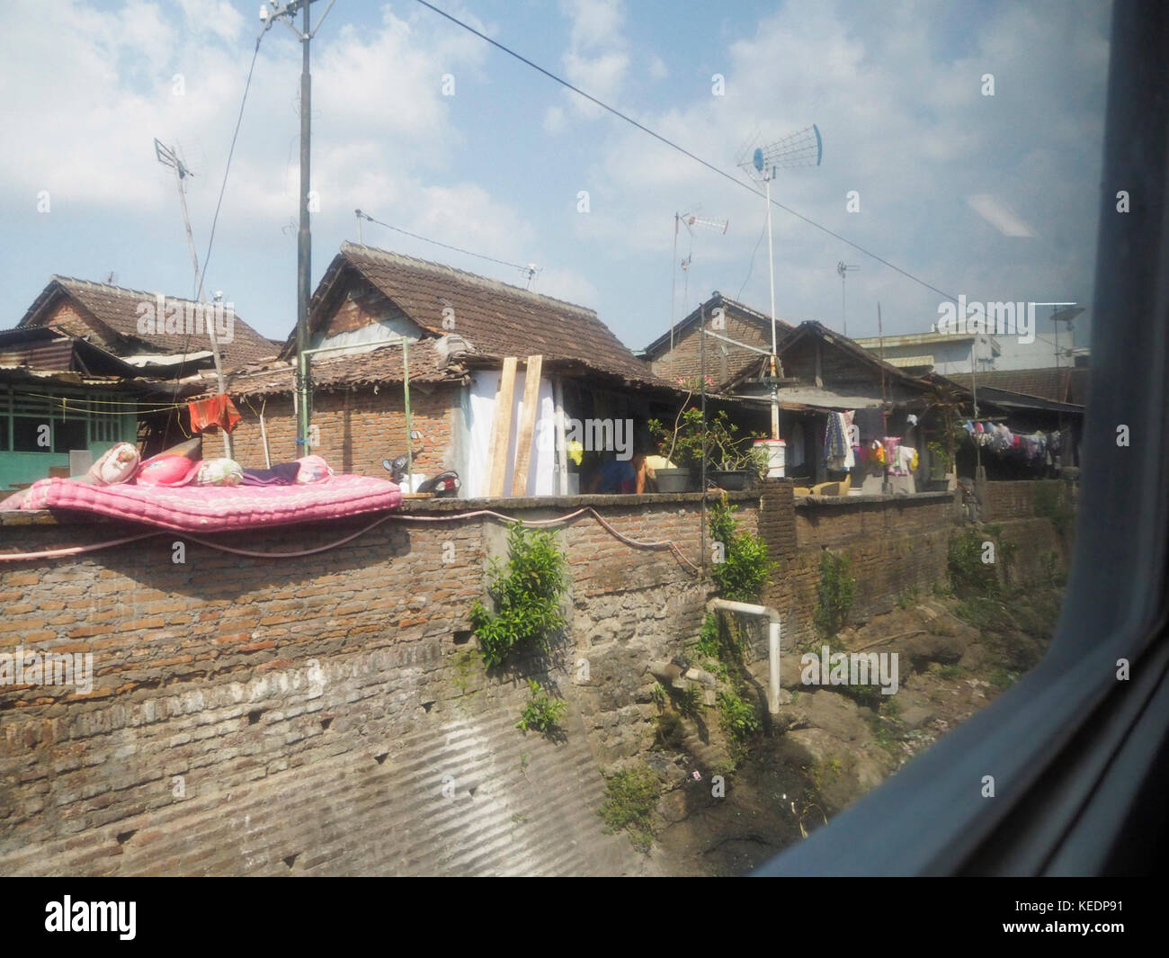 Village by the side of railway track in Surakarta (Solo), Central Java ...