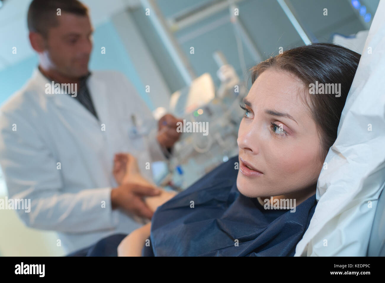 Woman nervous of injection Stock Photo - Alamy