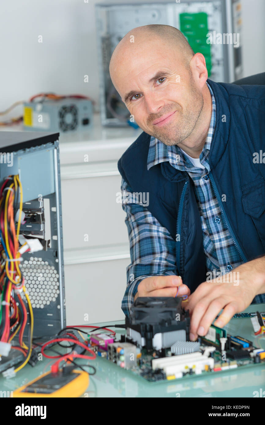 small electronic parts assembler Stock Photo - Alamy