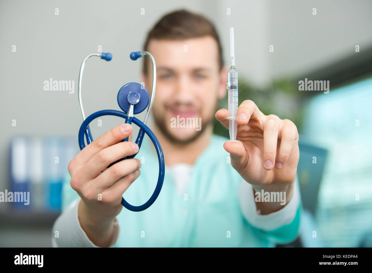 doctor nurse holding a syringe ready an injection Stock Photo - Alamy