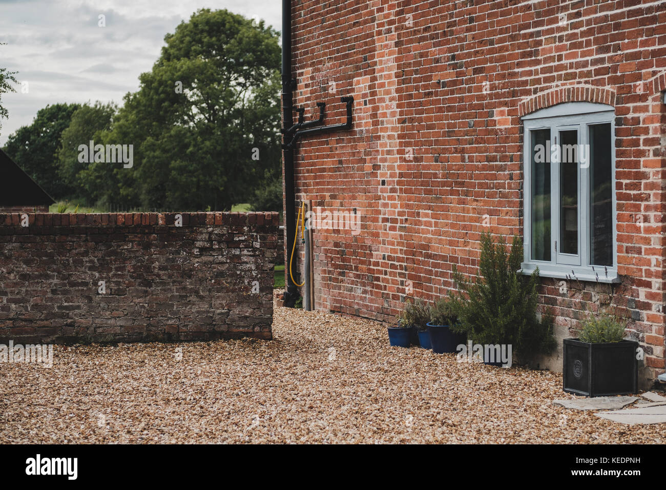 rustic red wall in English country side farm house Stock Photo - Alamy