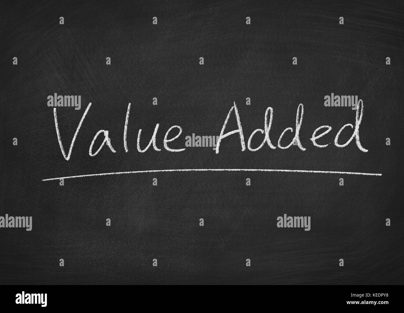 value added concept words on a blackboard background Stock Photo - Alamy