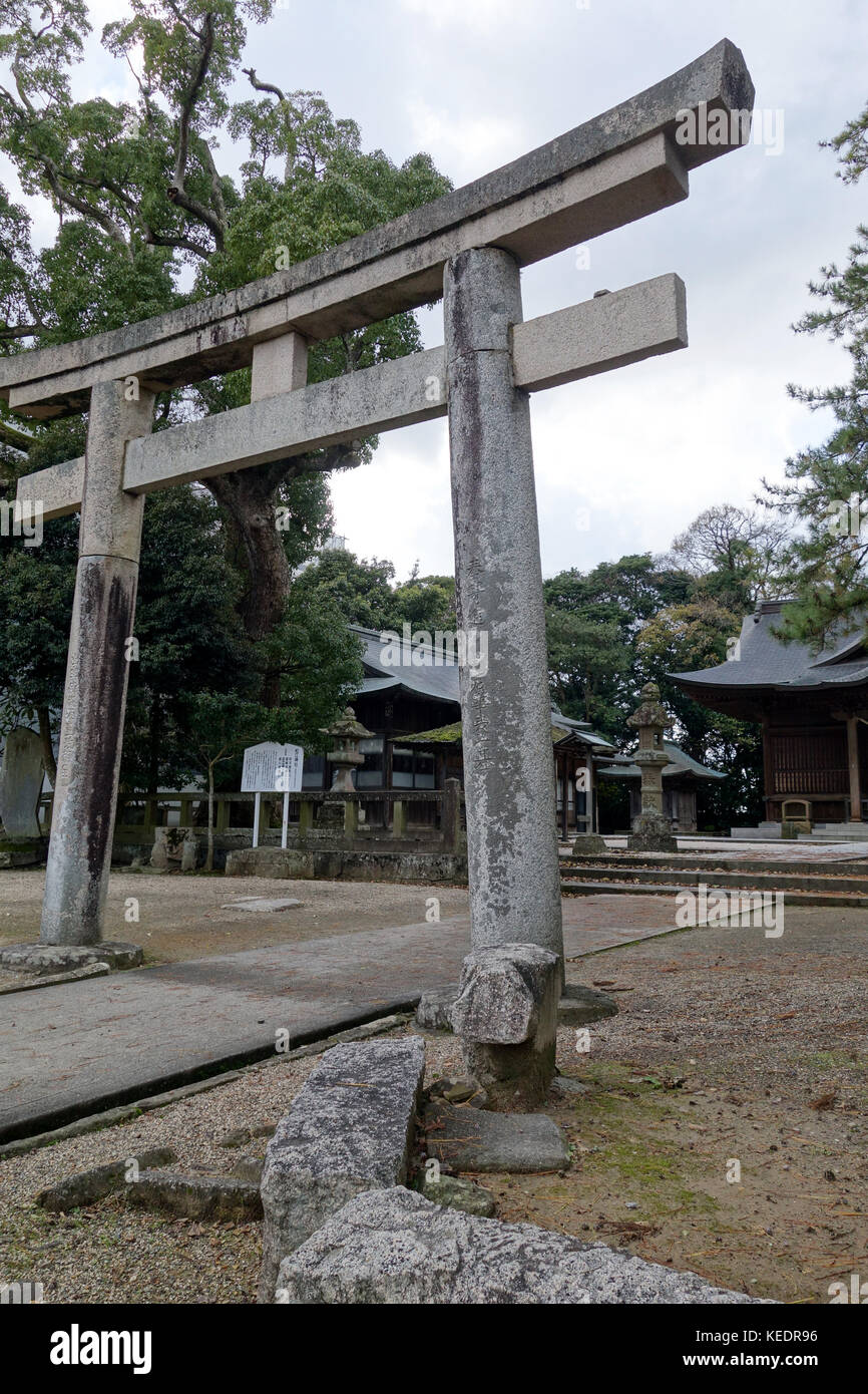 Torii stone gate - a symbol of japan temple Stock Photo - Alamy